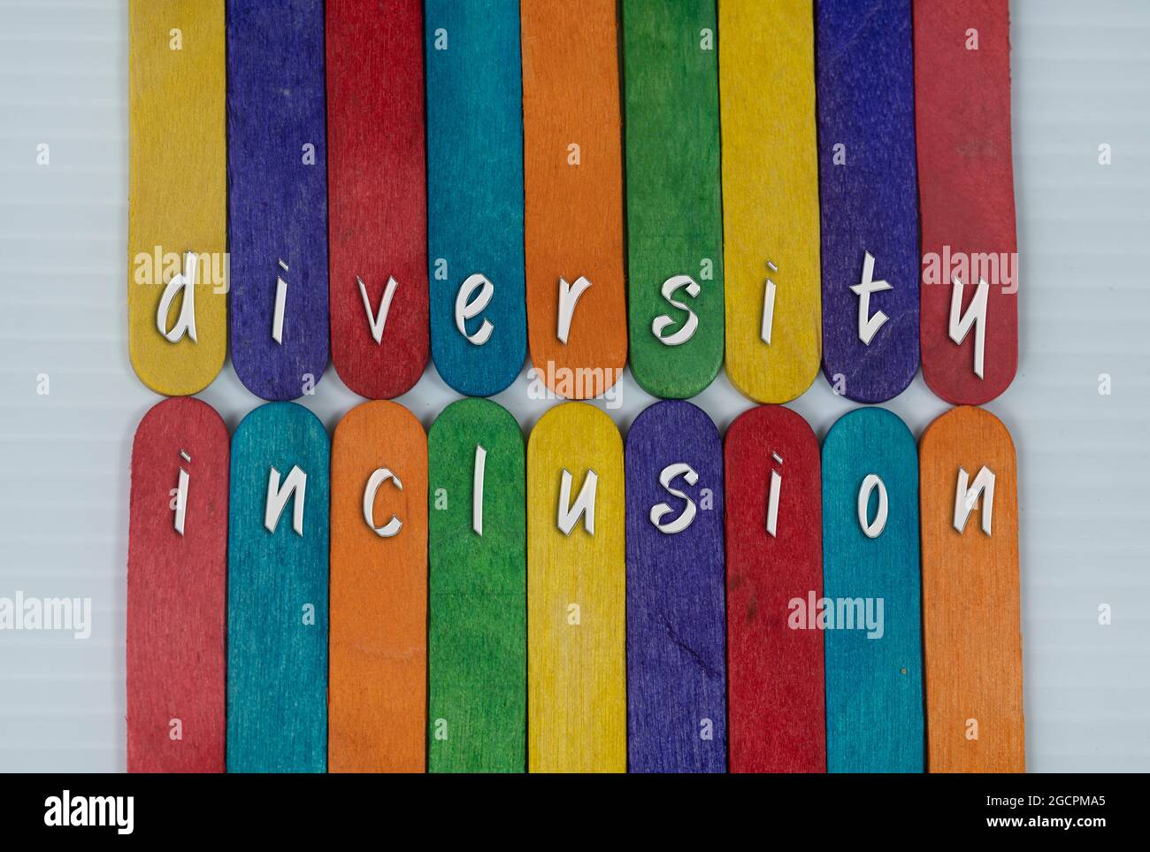 Business concept. Multicoloured stick with text diversity and inclusion ...