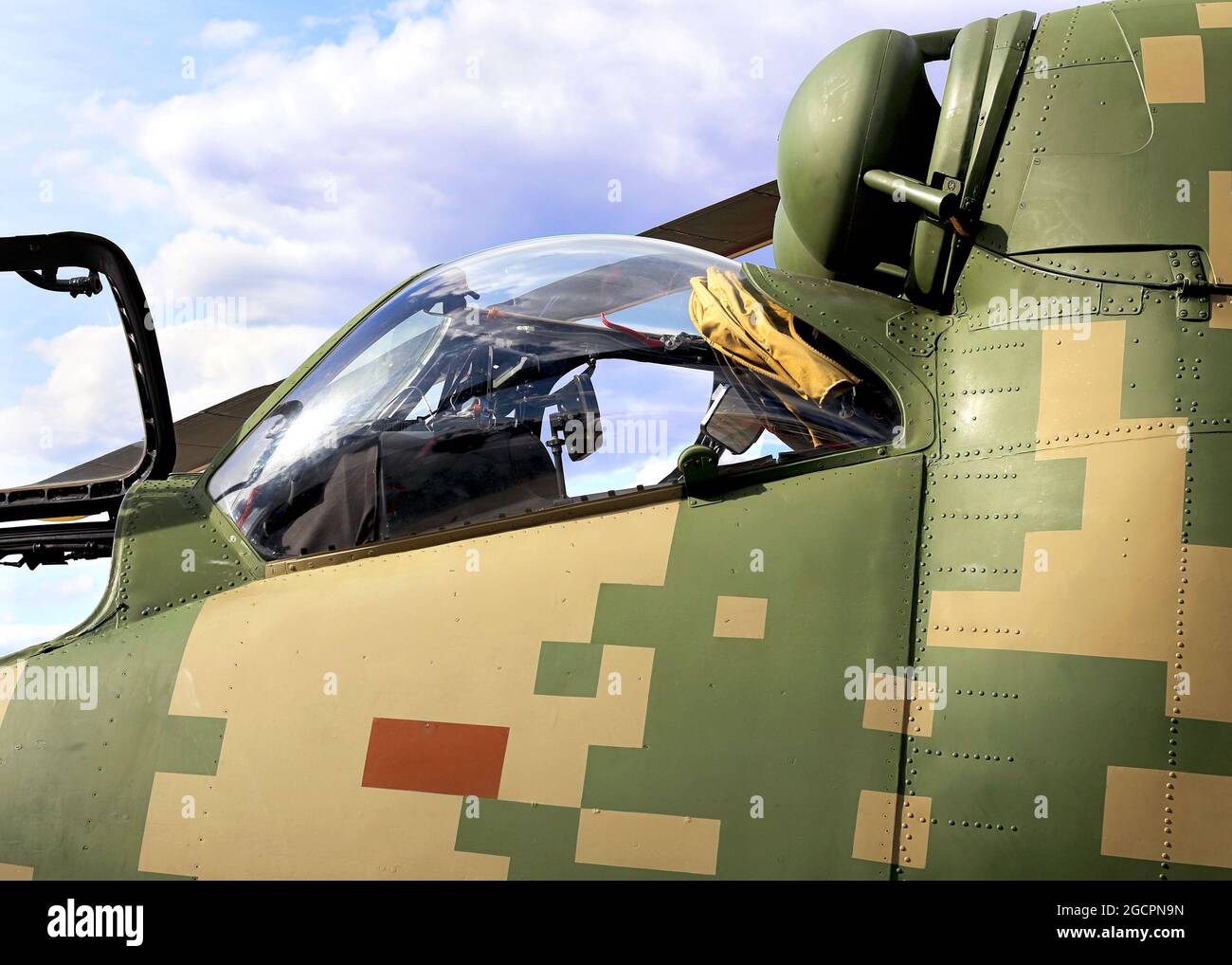 Double cabin of the camouflage painted helicopter Stock Photo - Alamy