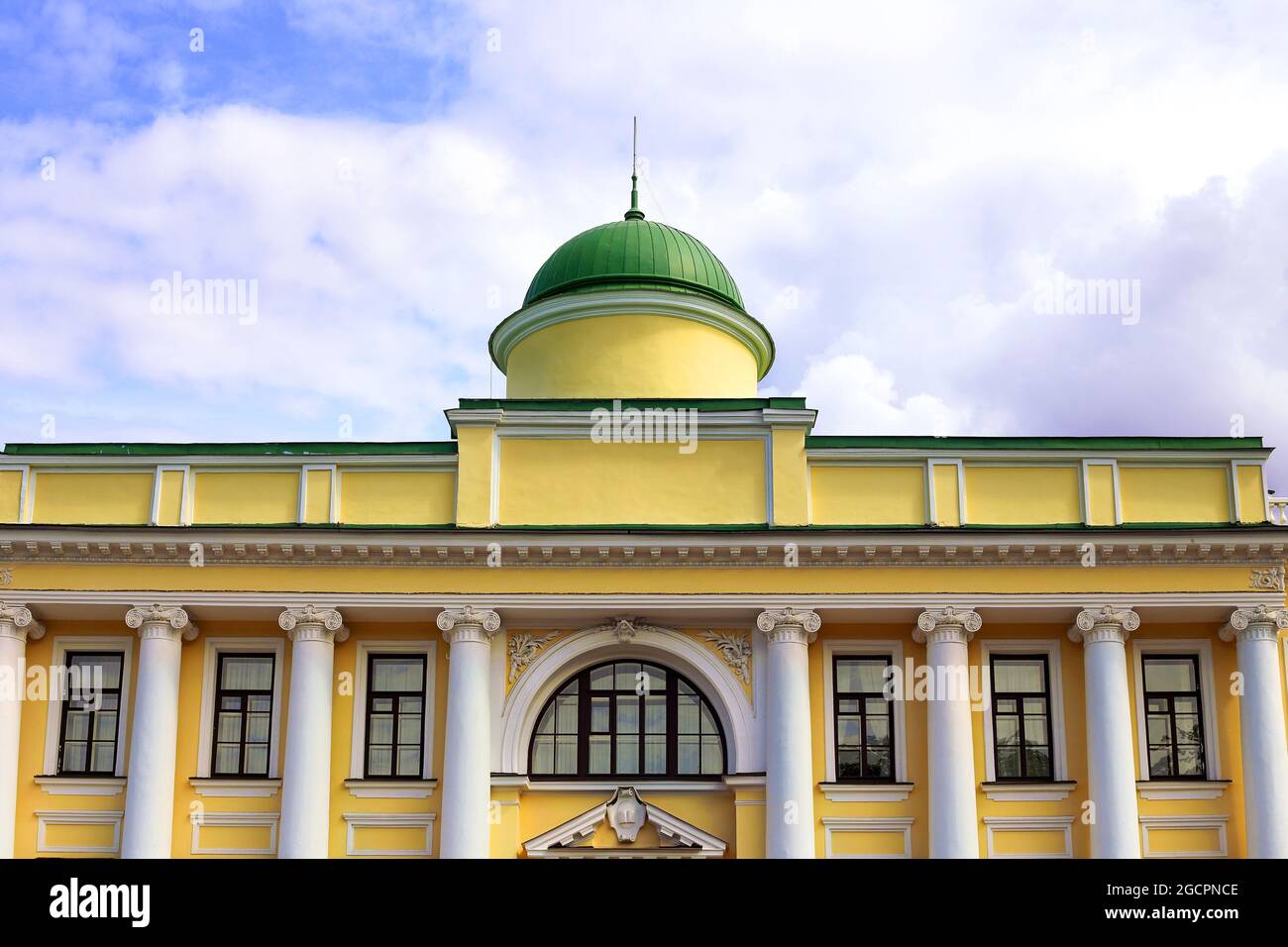 Empire style old time building with round turret and decorative ...