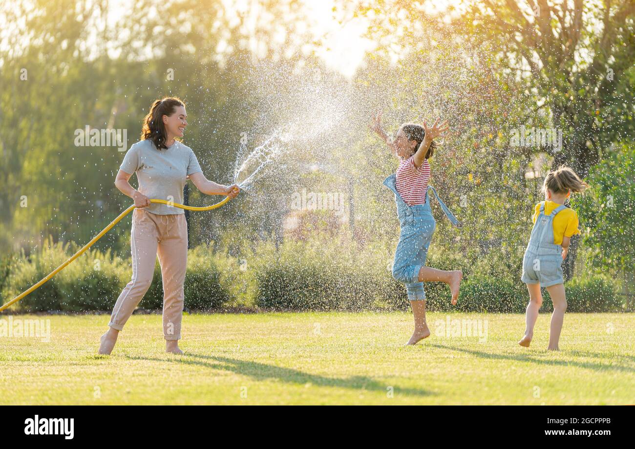 Playing in backyard hi-res stock photography and images - Alamy