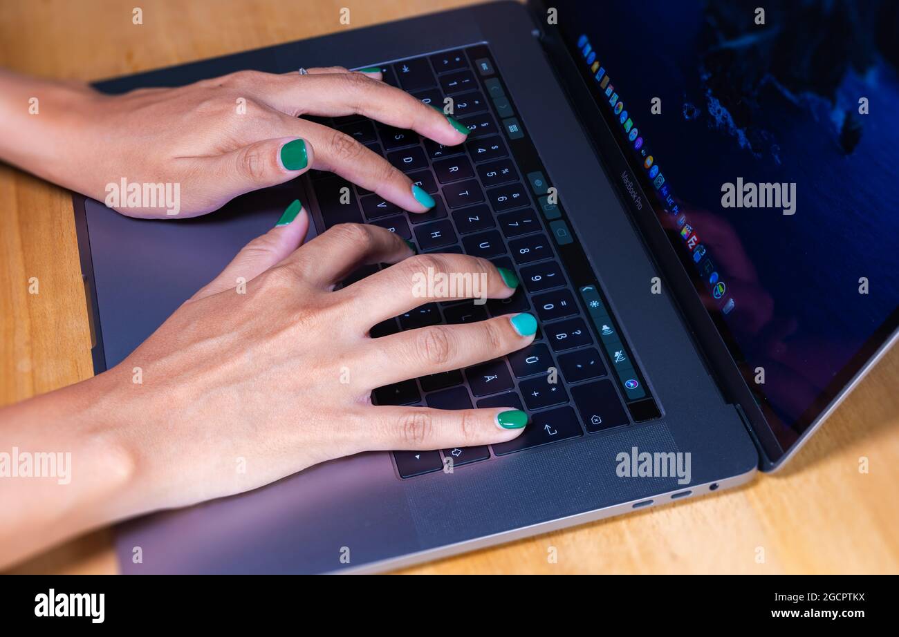 Cyberjaya, Malaysia - October 13, 2020: Woman hands typing on a ...