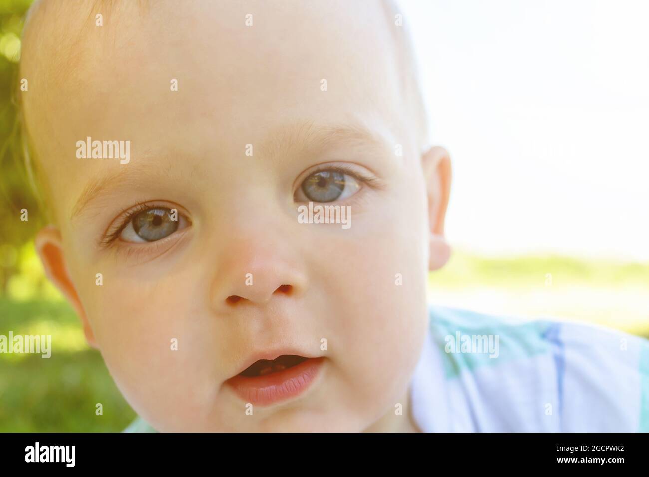 Funny baby boy looking in camera. Close-up Stock Photo - Alamy
