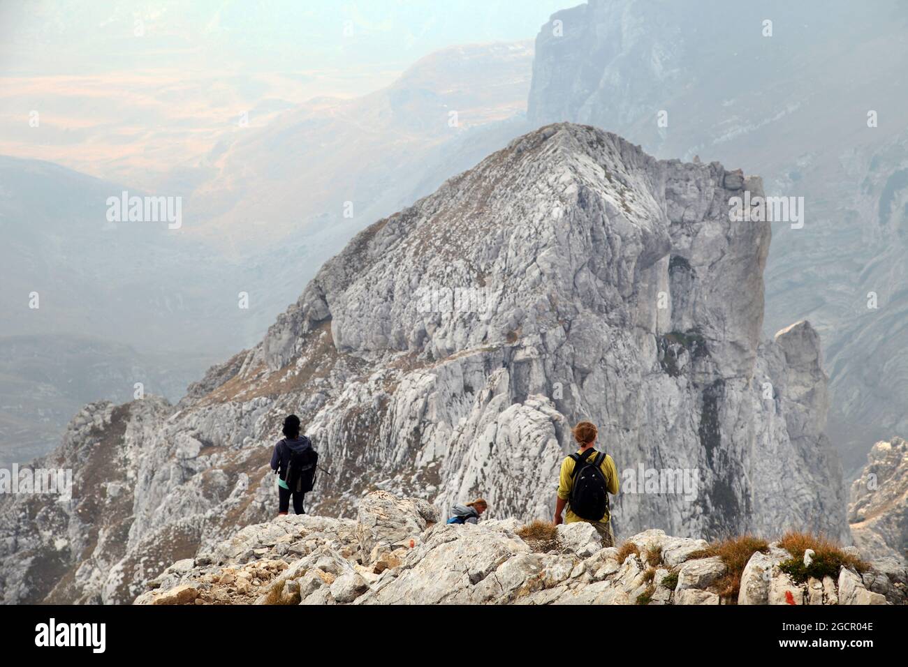 Mountaineers going down Mount Bobotov Kuk at Durmitor National Park in ...