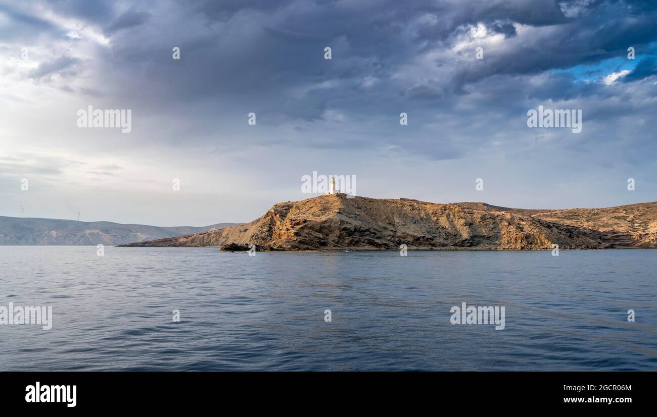 Prasonisi lighthouse in evening light, dramatic cloudy sky, Rhodes ...
