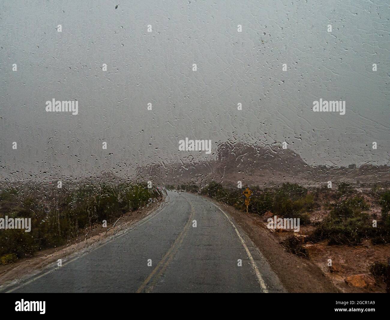 Raindrops on a car window, driving in the rain, Arches Scenic Drive ...