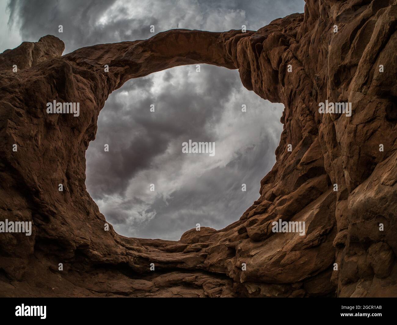 Thunderclouds over rock formations of the Windows Selection, Arches ...