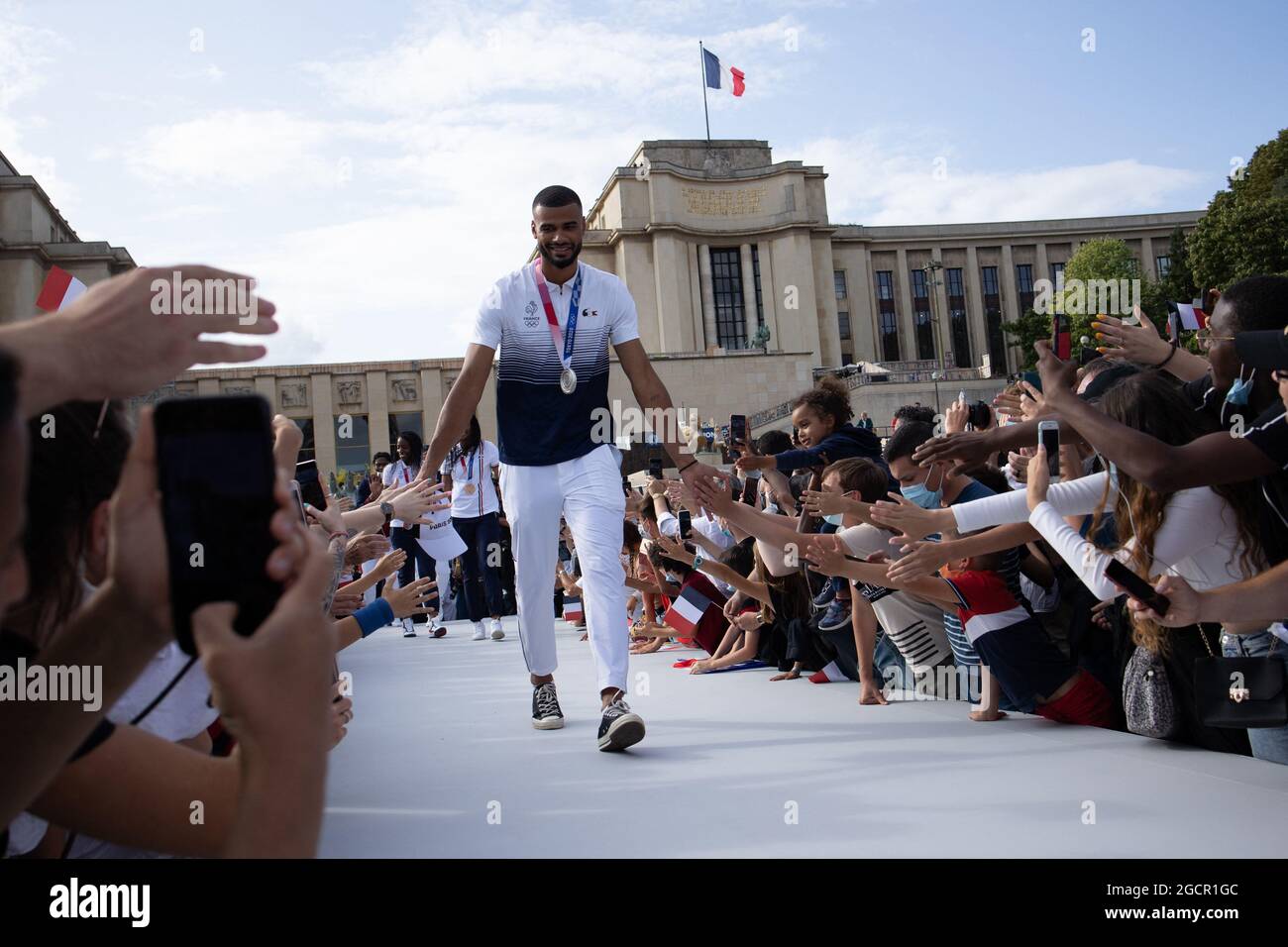 French men Basketball team arrives on stage, in front of the Eiffel ...