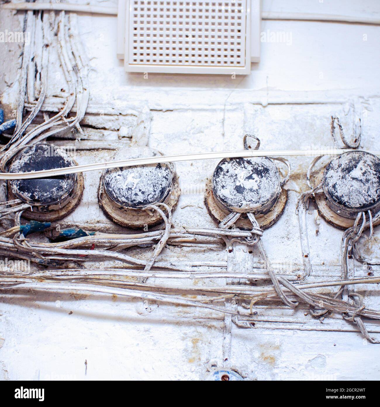 Old telephone junction boxes on a white wall Stock Photo - Alamy