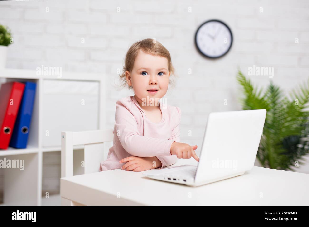 childhood, education and technology concept - portrait of cute little ...