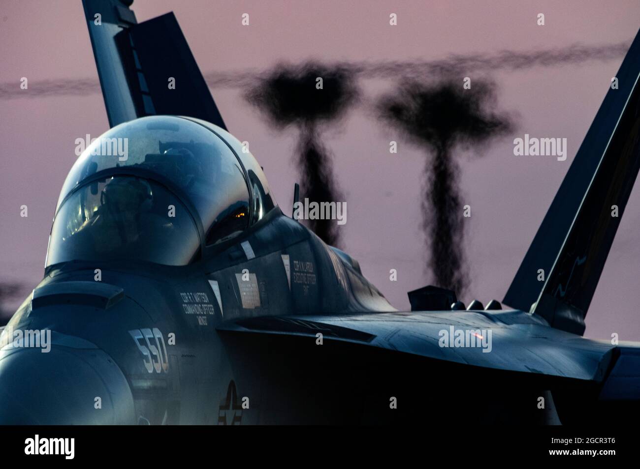 Pilots inside a E/A-18G Growler assigned to the Electronic Attack ...