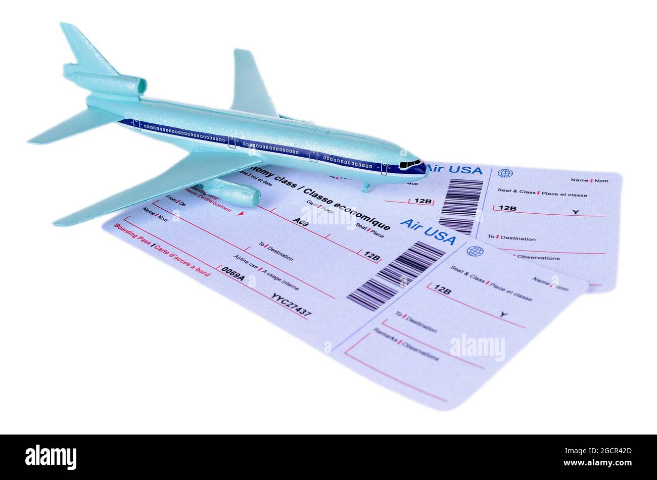 Airline tickets isolated on white Stock Photo - Alamy