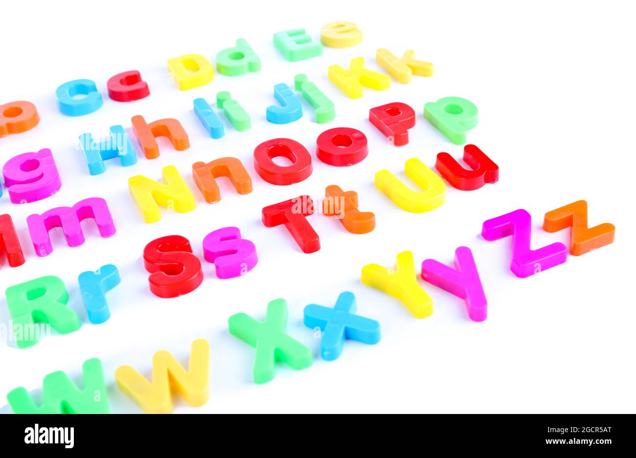 Colorful magnetic letters isolated on white Stock Photo - Alamy