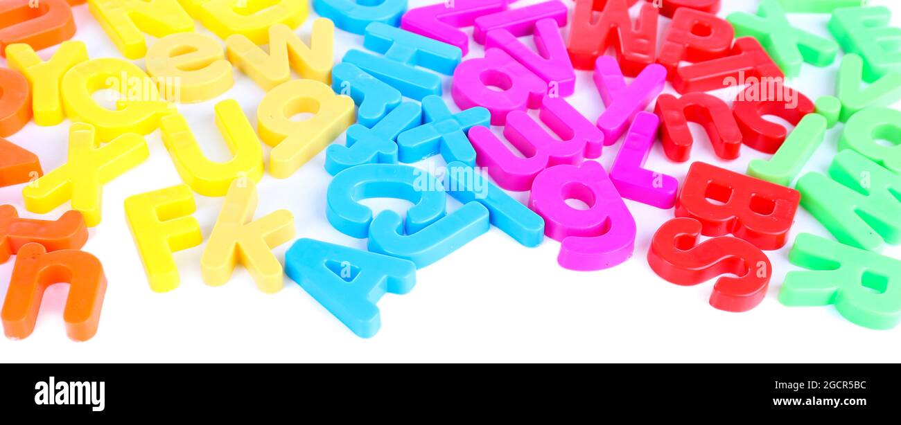 Colorful magnetic letters isolated on white Stock Photo - Alamy