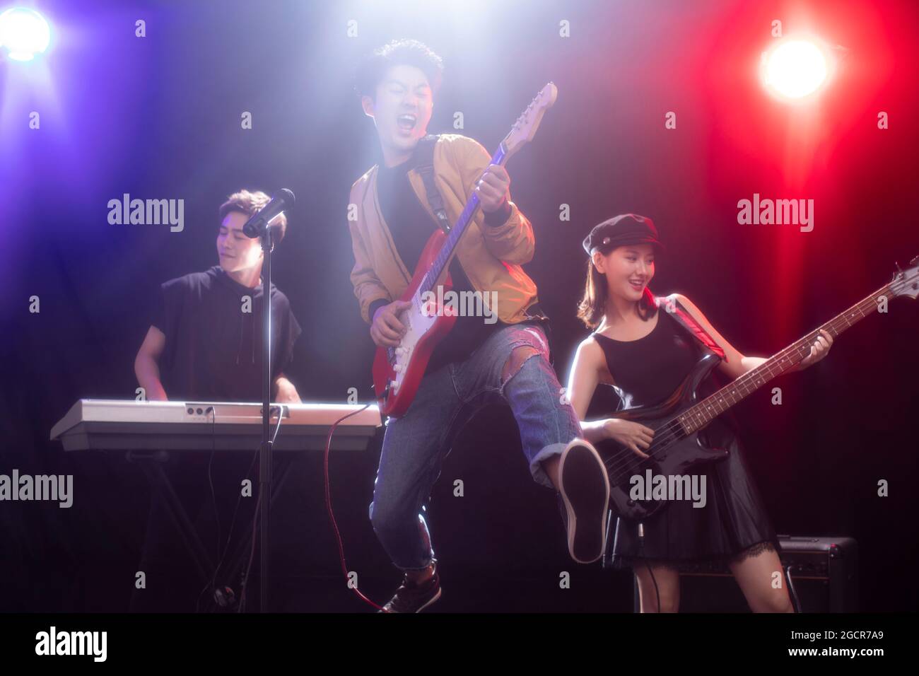 Guitarist jumping in band hi-res stock photography and images - Alamy