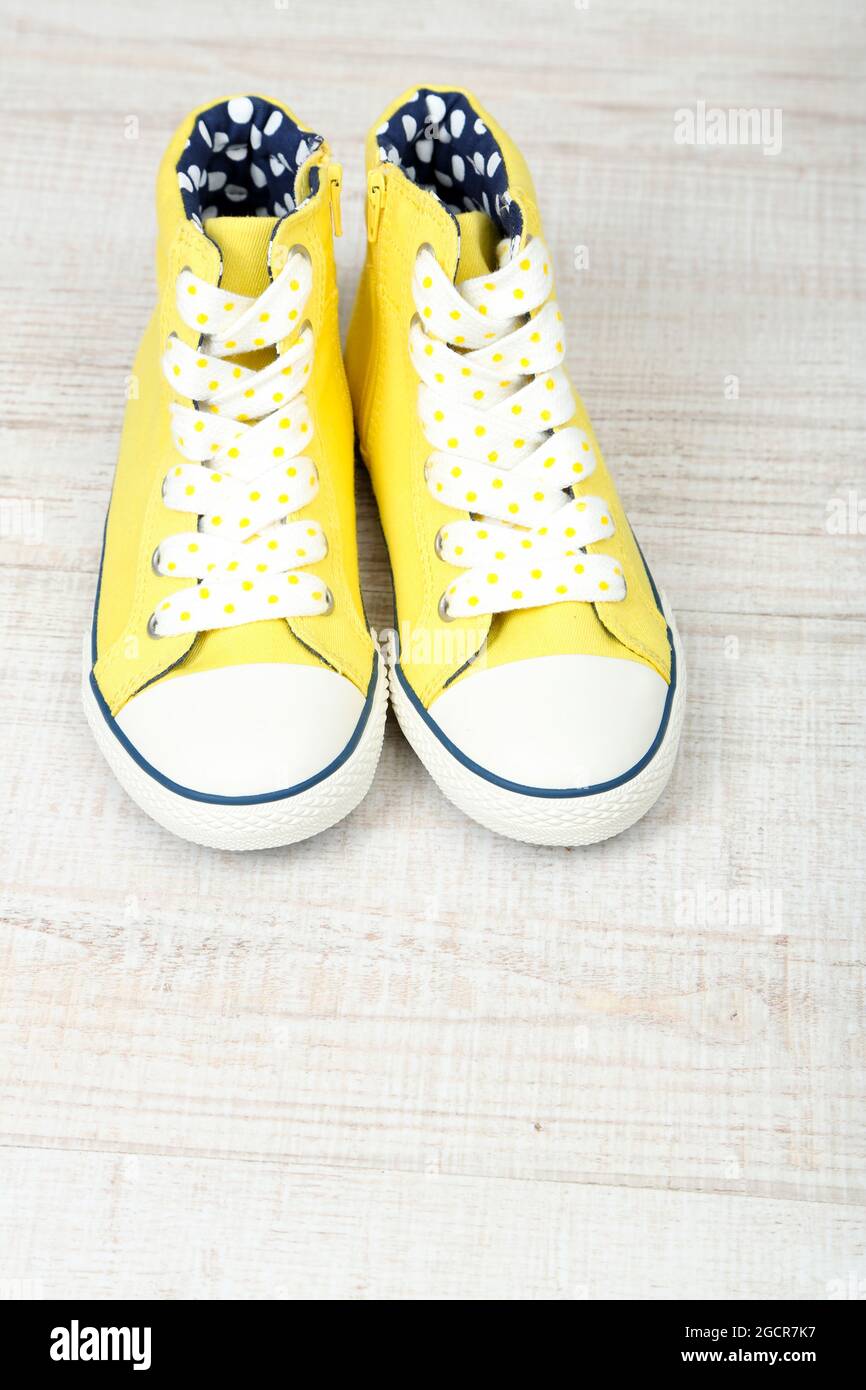 Beautiful gumshoes, on wooden floor Stock Photo - Alamy