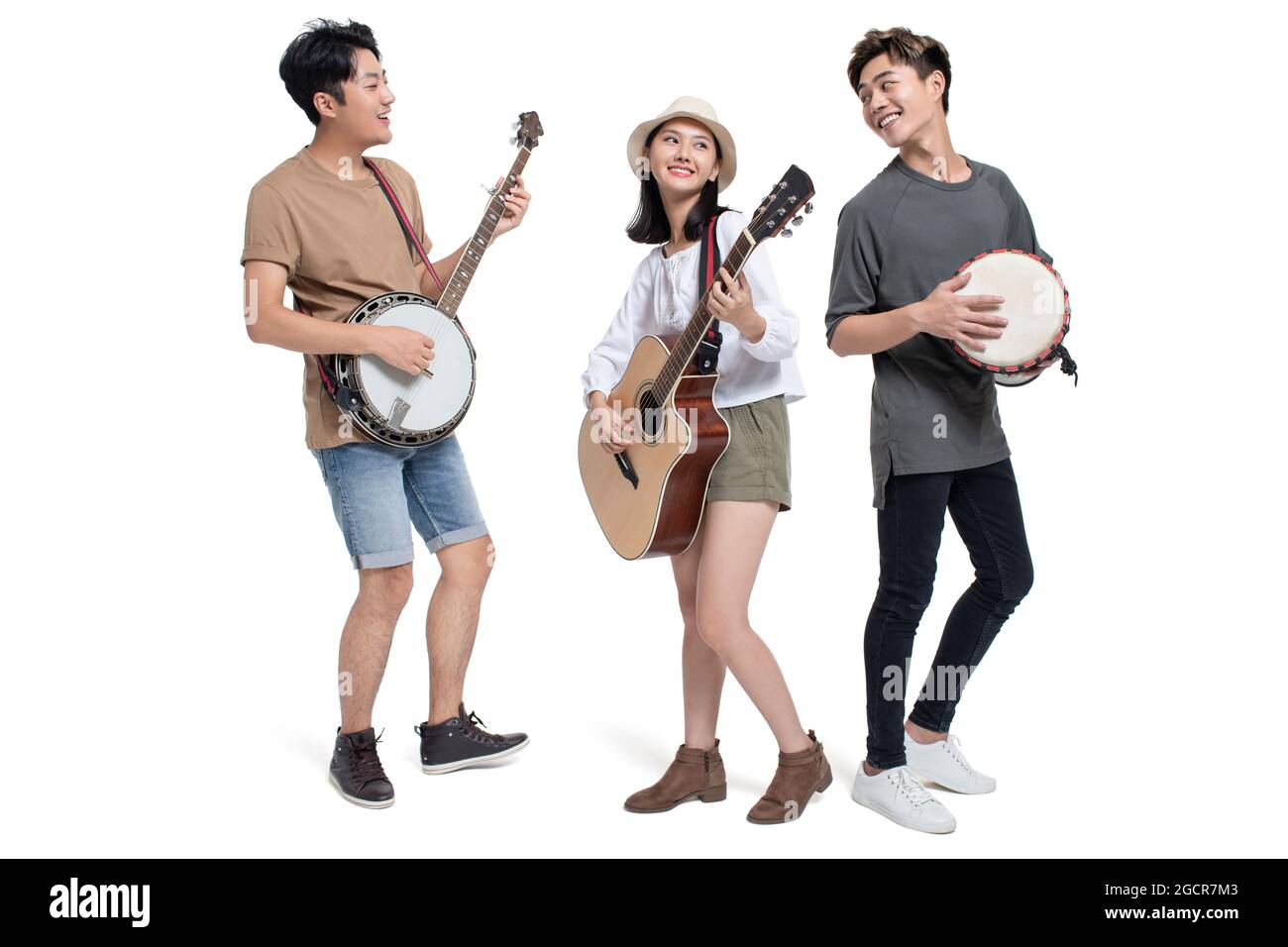 Young people playing musical instrument Stock Photo - Alamy