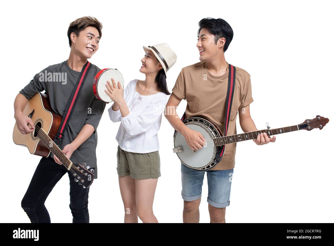 Young people playing musical instrument Stock Photo - Alamy