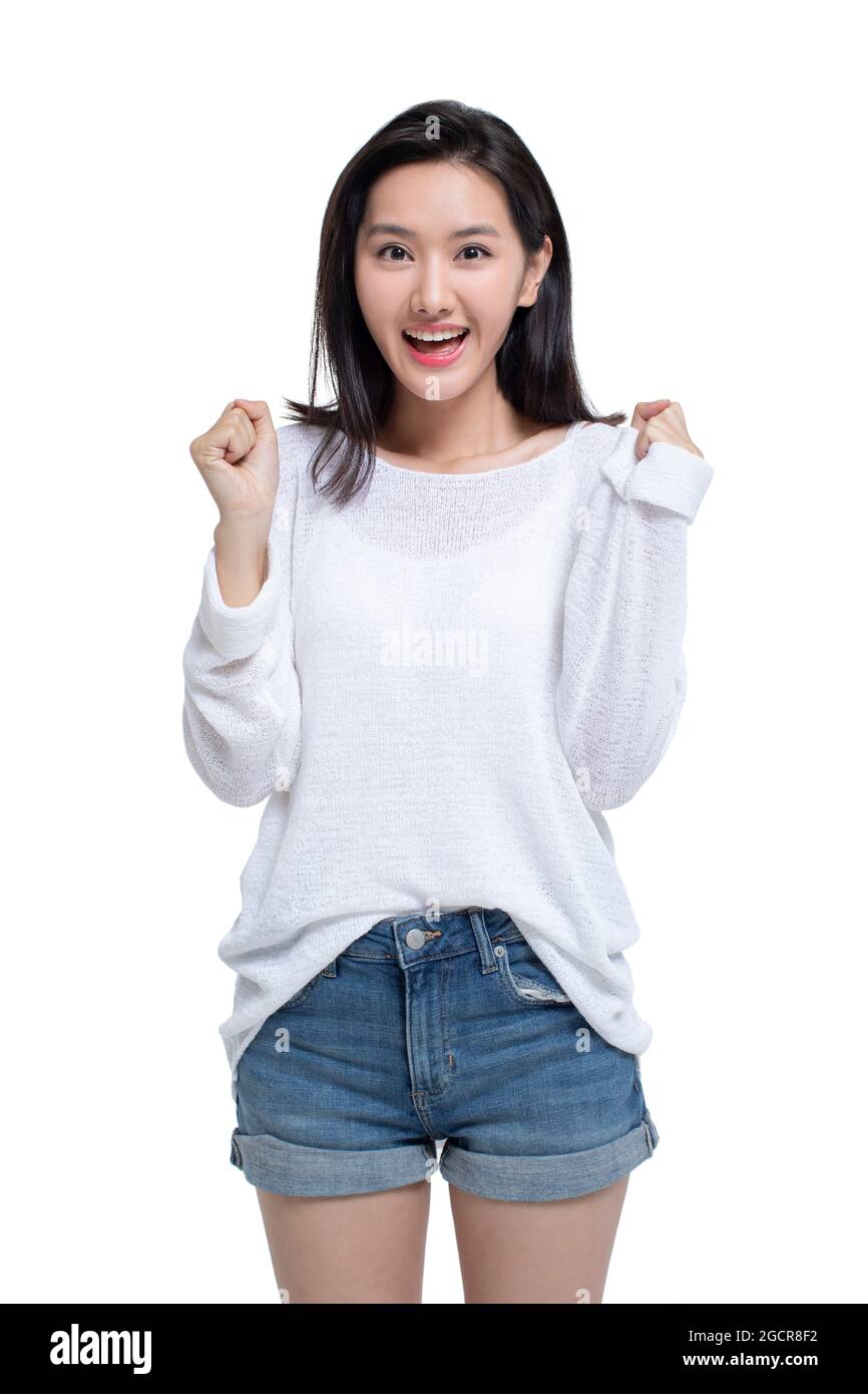 Excited young woman Stock Photo - Alamy