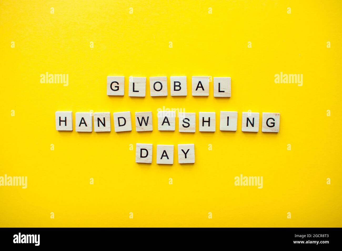 The inscription global handwashing day from wooden blocks on a bright ...