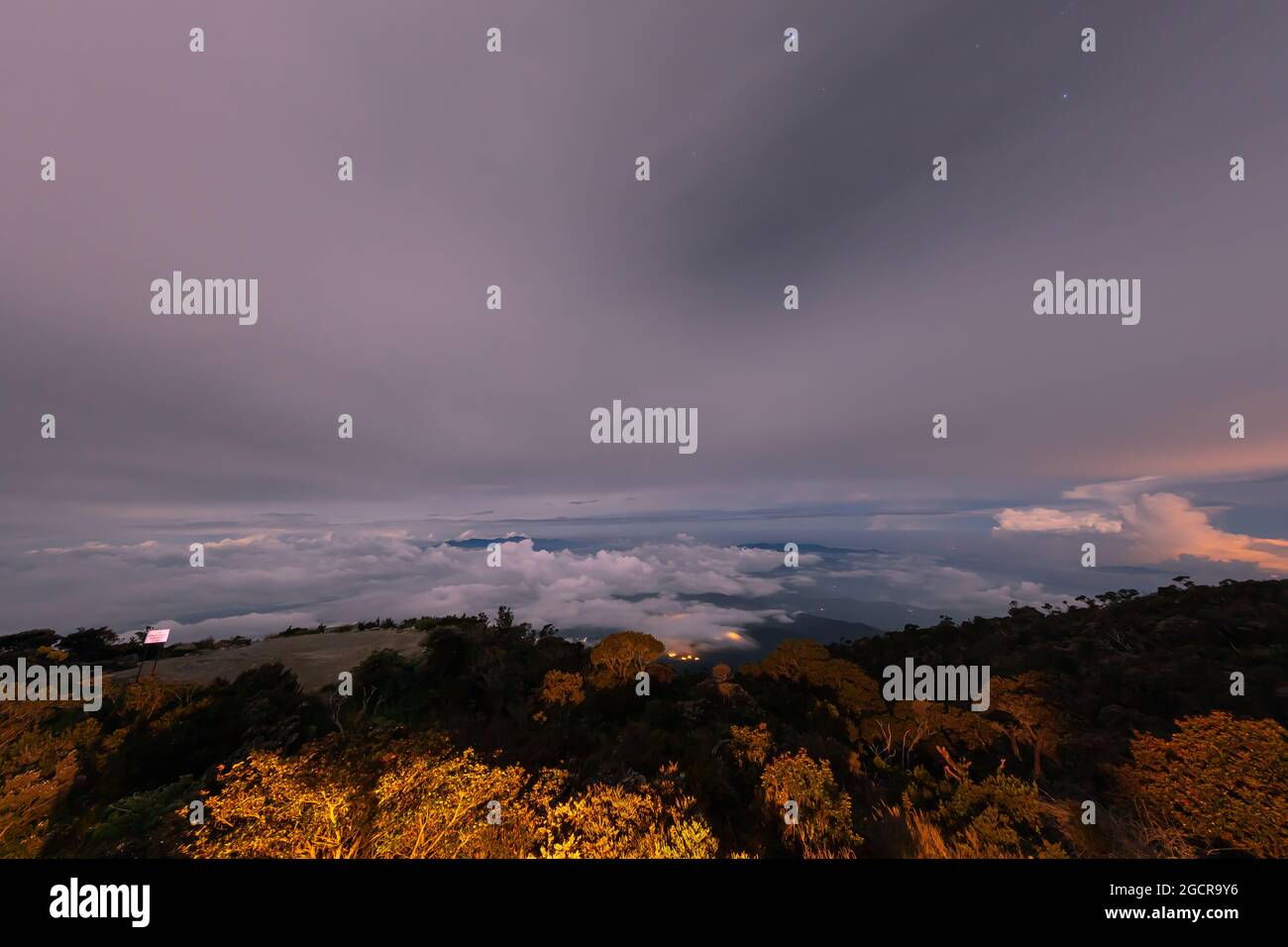Sunset at the peak of Mount Kinabalu, Sabah, Borneo, Malaysia. The Mt ...