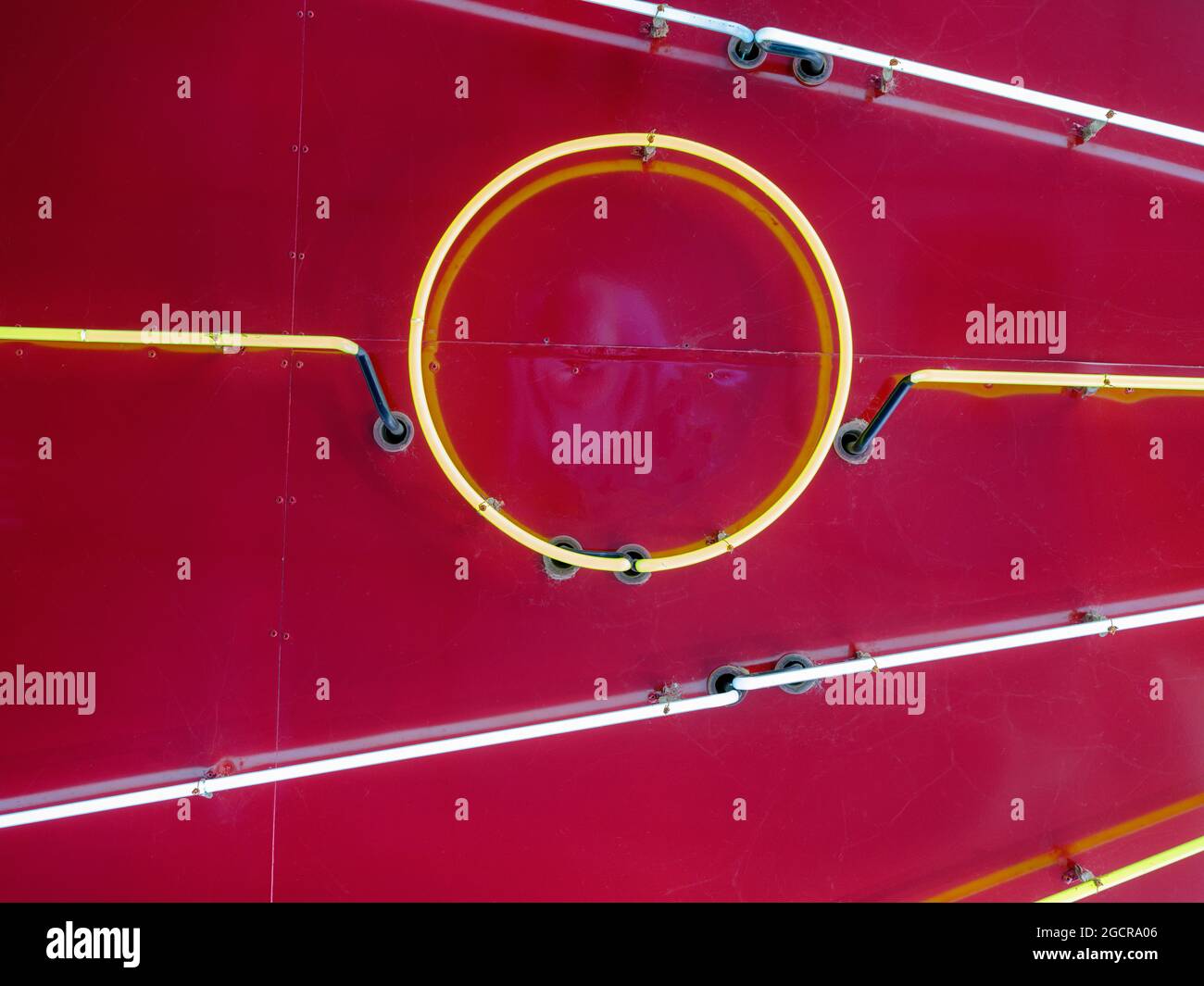 The illuminated neon on the ceiling of the entrance to a movie theatre ...