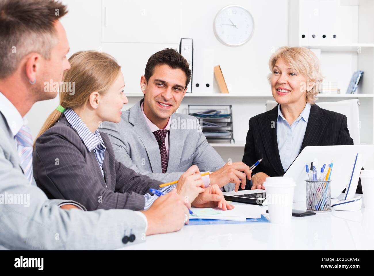 Business colleagues planning work at meeting Stock Photo - Alamy