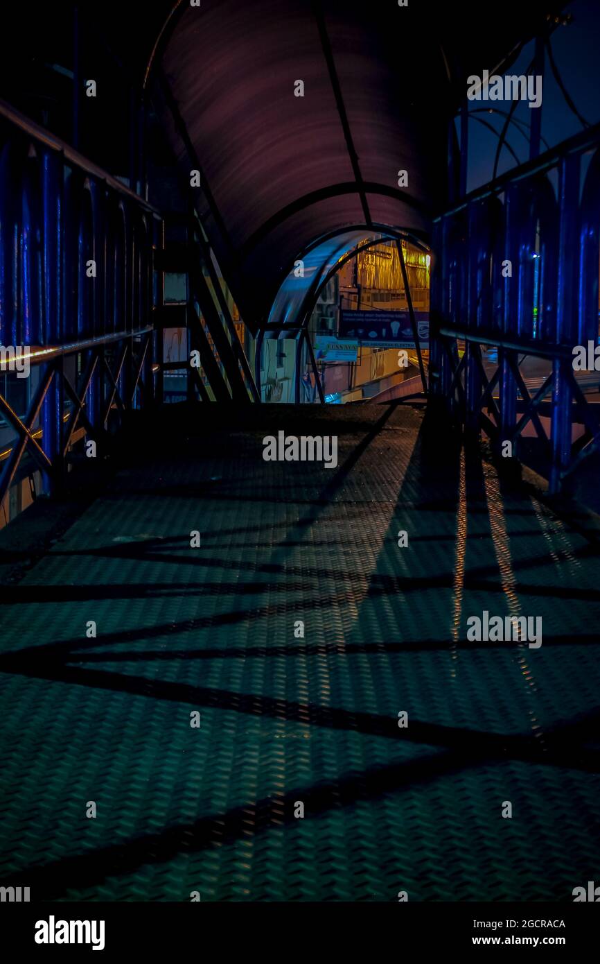 A pedestrian bridge made of iron Stock Photo - Alamy