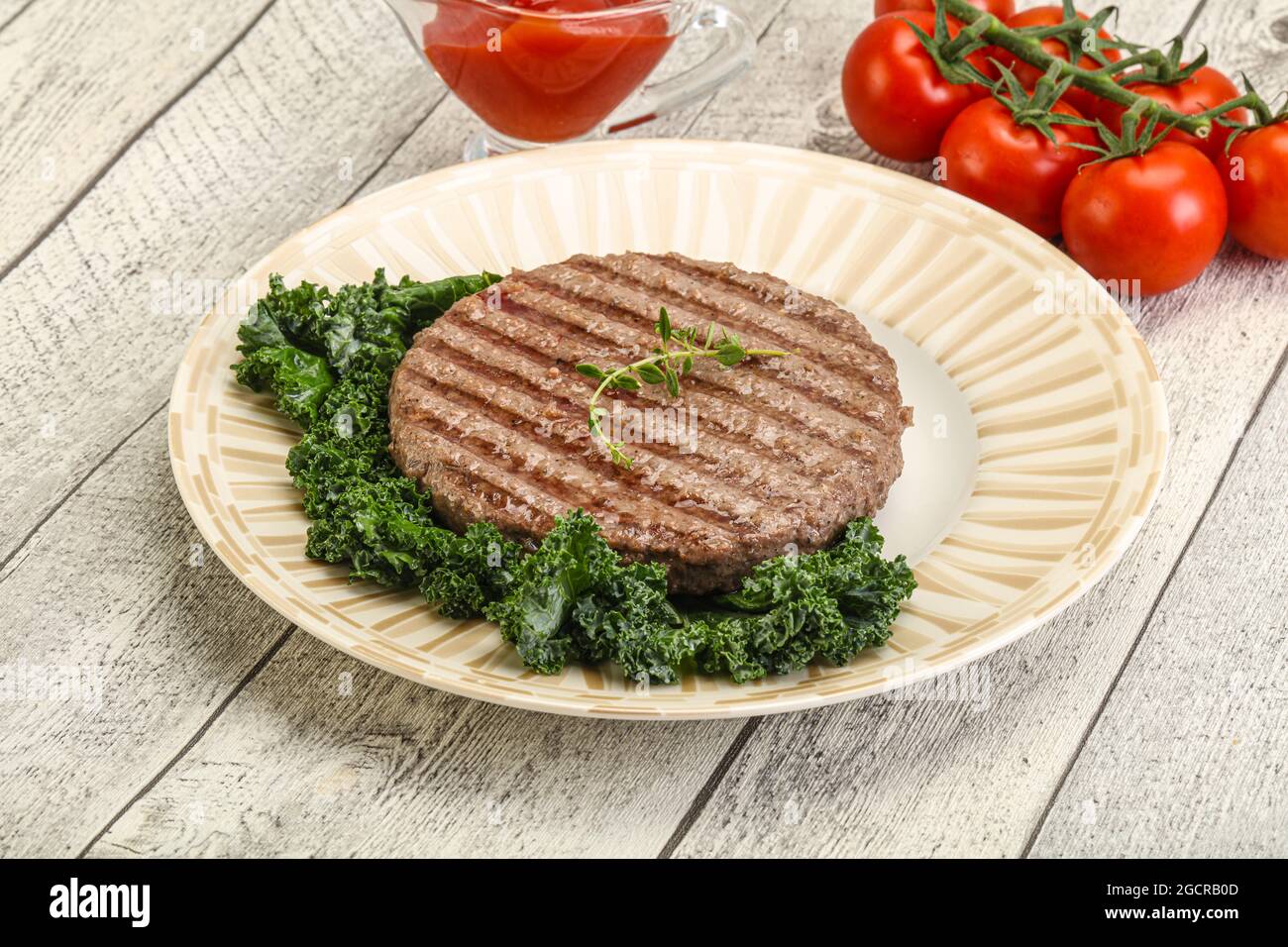 Grilled tasty beef cutlet for burger Stock Photo - Alamy
