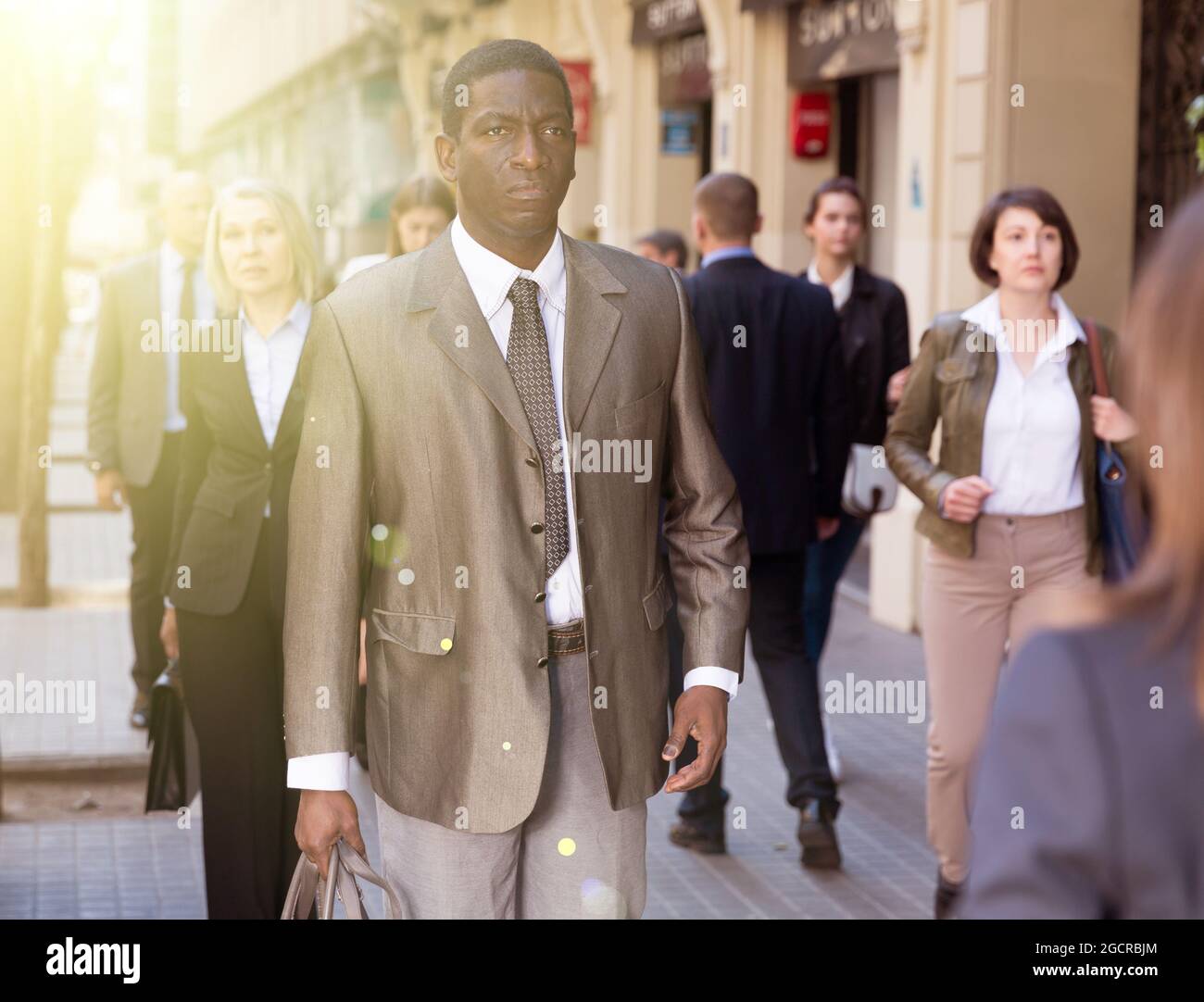 Afro man in business suit Stock Photo - Alamy