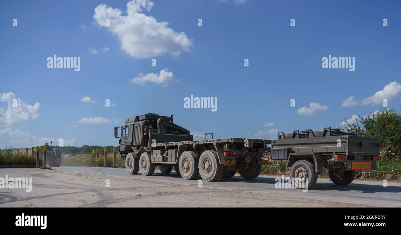 British army MAN SV HX77 8x8 EPLS Heavy Utility Trucks in action on a ...