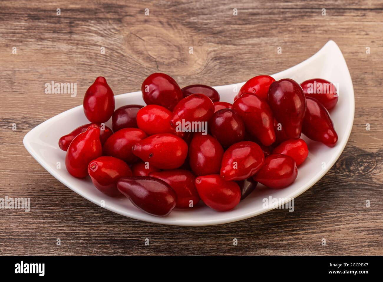 Sweet and ripe cornel or dogtree berries Stock Photo - Alamy