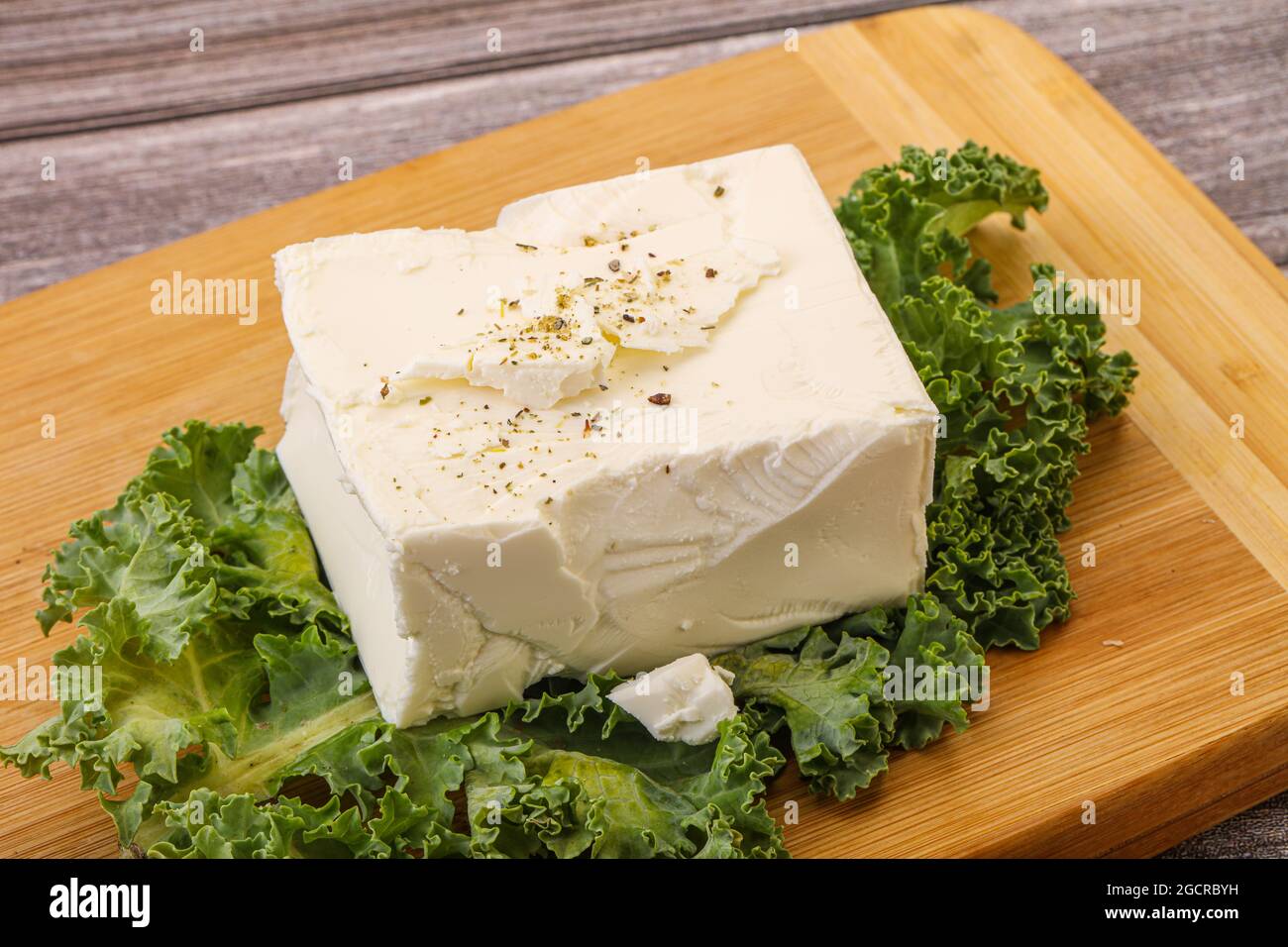 Traditional tasty Greek Feta soft cheese brick Stock Photo - Alamy
