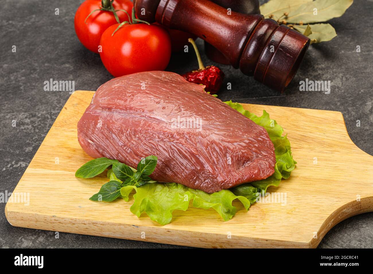 Raw beef meat piece for cooking Stock Photo - Alamy