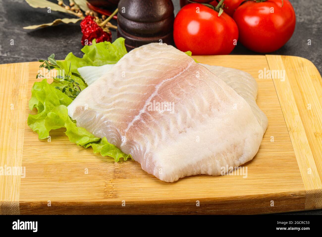 Raw pangasius fillet fish for cooking Stock Photo - Alamy