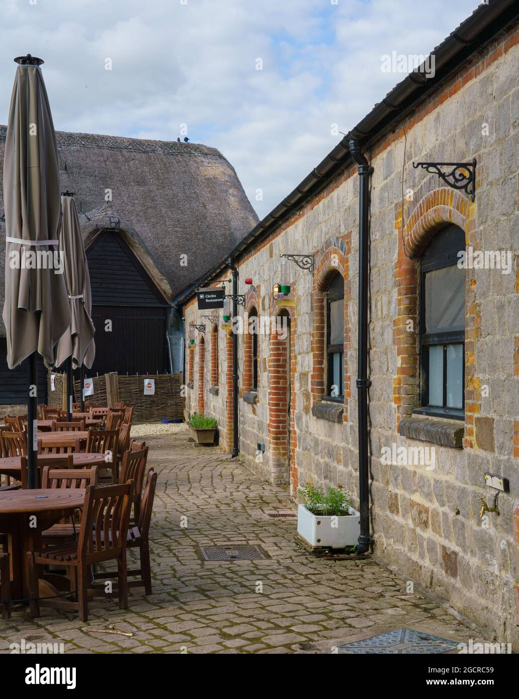 an old tythe barn and adjacent stable block converted to a bar, cafe ...