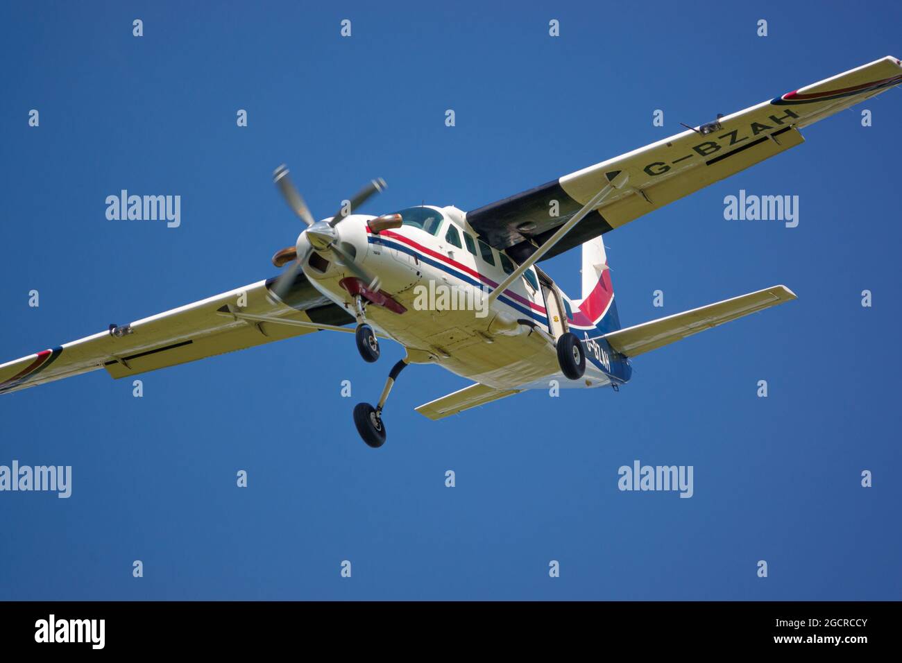 Cessna 208b Grand Caravan G-CPSS light aircraft returning to land after ...