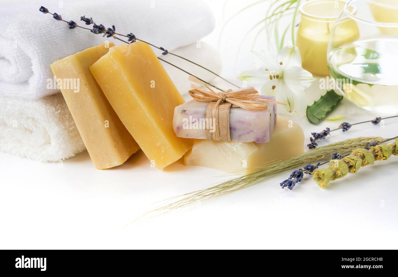 Handmade Soap with bath towels on white Stock Photo - Alamy