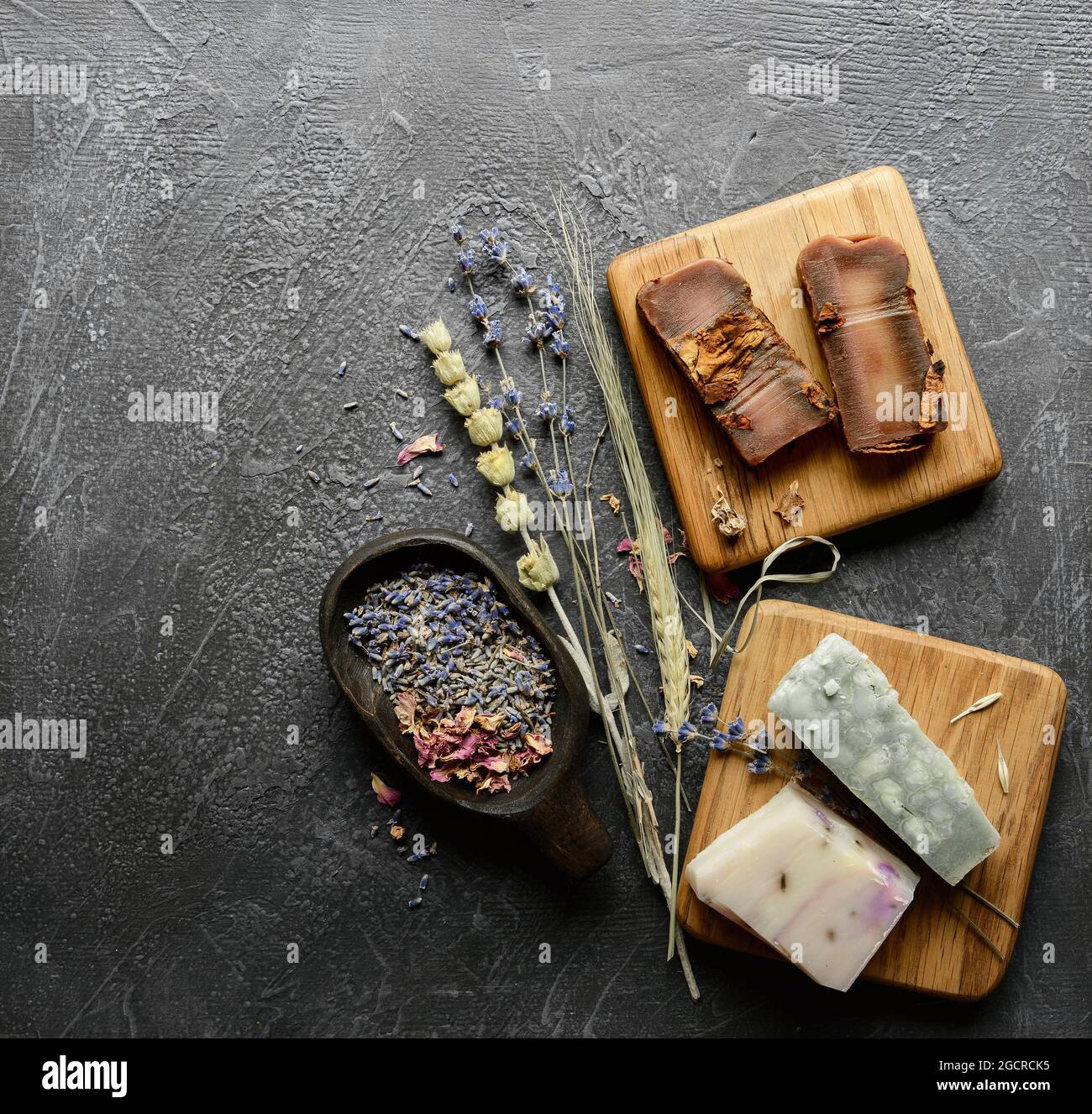 Handmade organic Soap on a black textured background Stock Photo - Alamy
