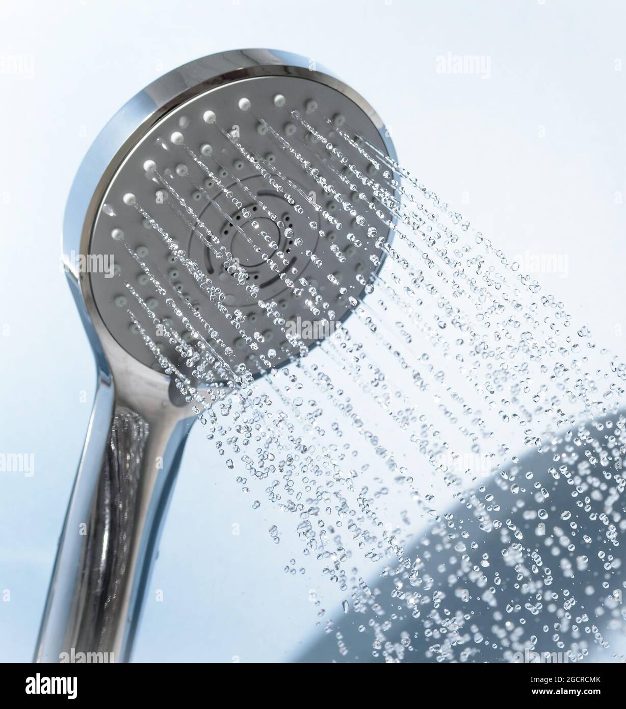 Shower head splashing water Stock Photo - Alamy