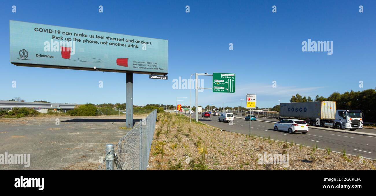 A roadside billboard with a COVID-19 alcohol health warning on General ...