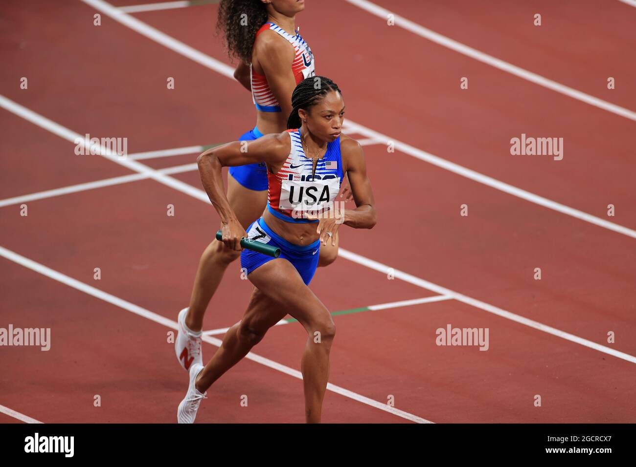 Allyson FELIX (USA) accepts the baton from Sydney McLAUGHLIN (USA) for ...