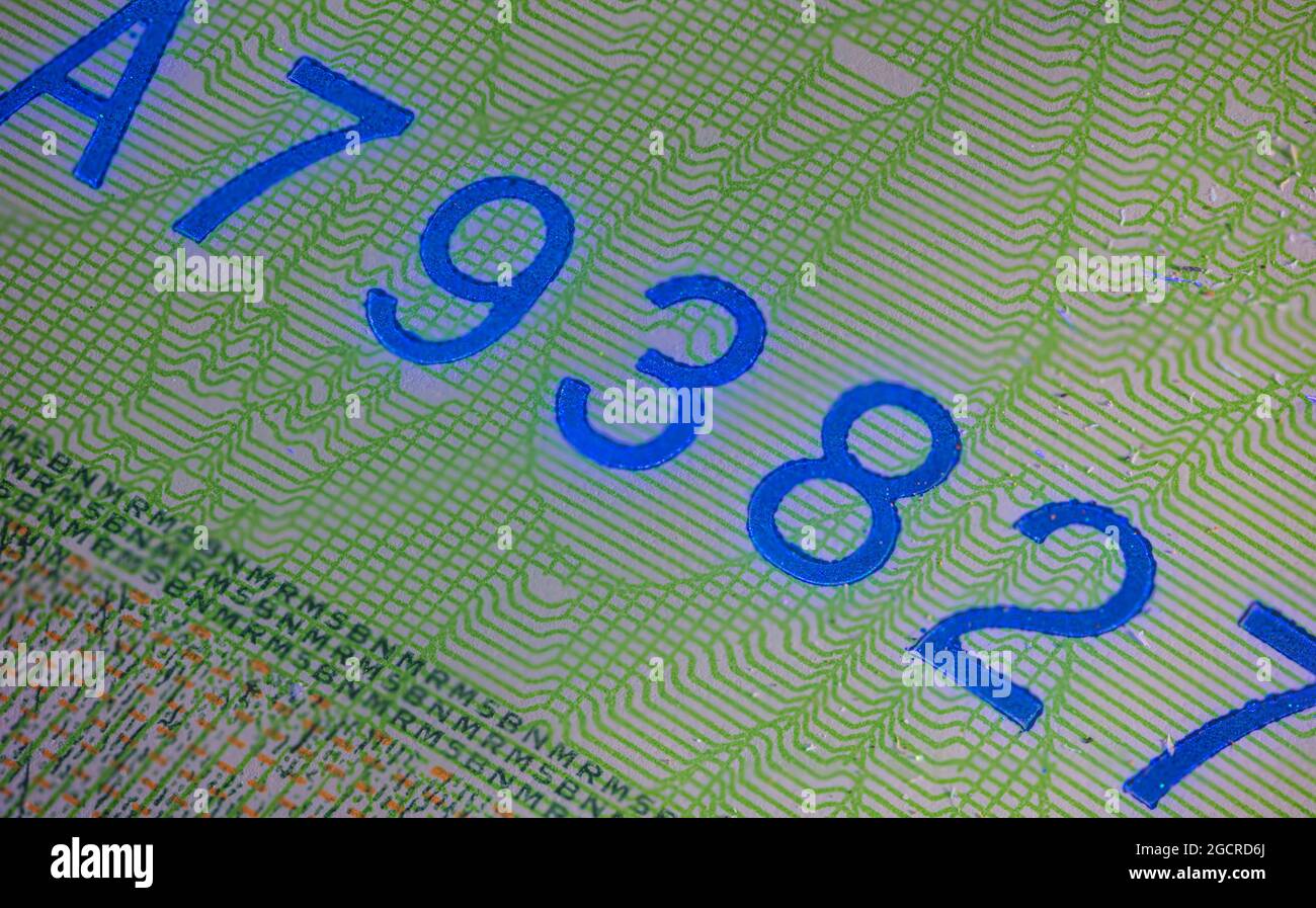 Macro photography of 5 Malaysian ringgit with fluor light. Extreme ...