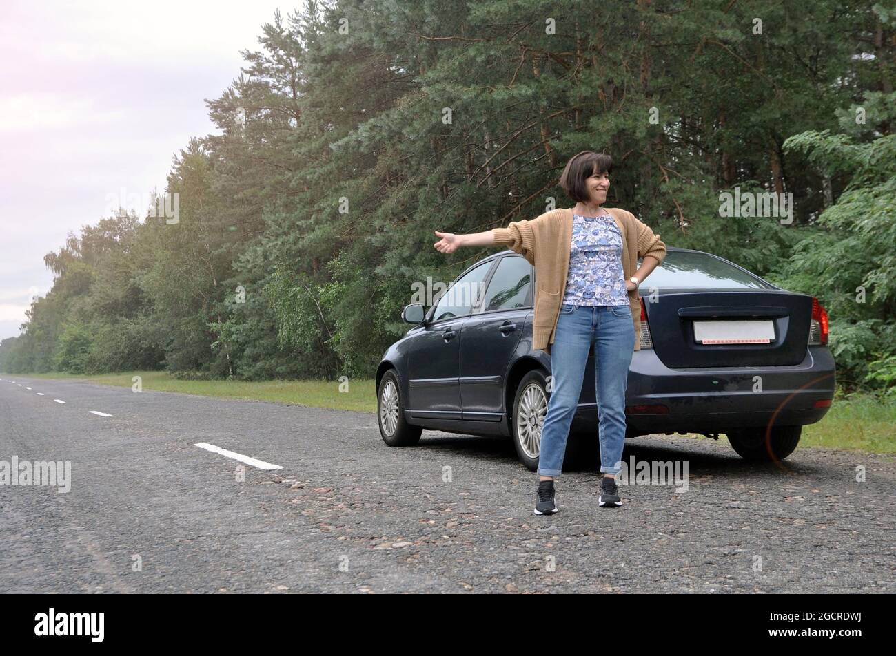 Woman experiencing car trouble hi-res stock photography and images - Alamy