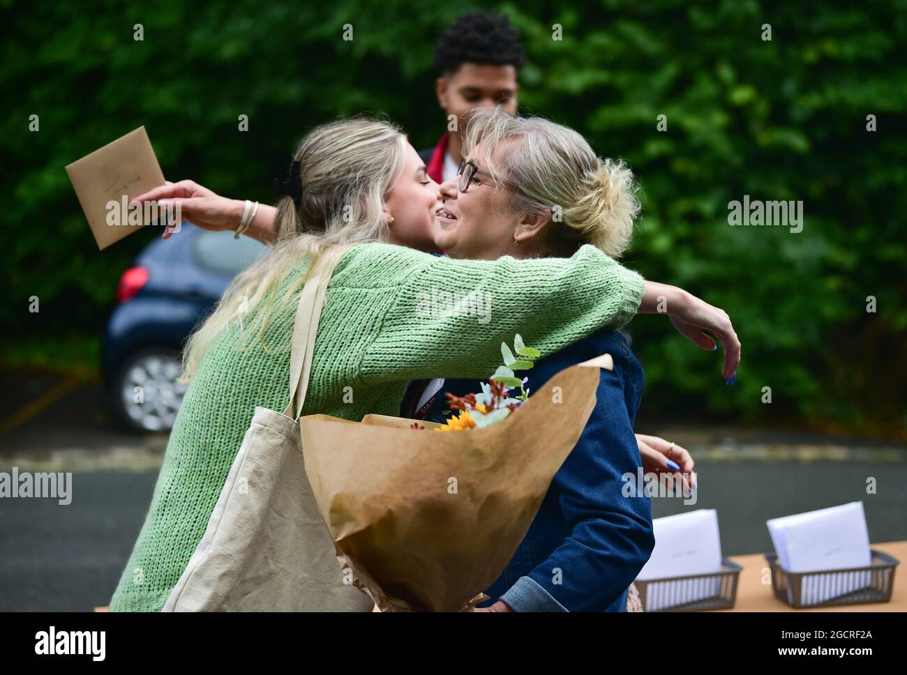 Teacher hug uk hi-res stock photography and images - Alamy