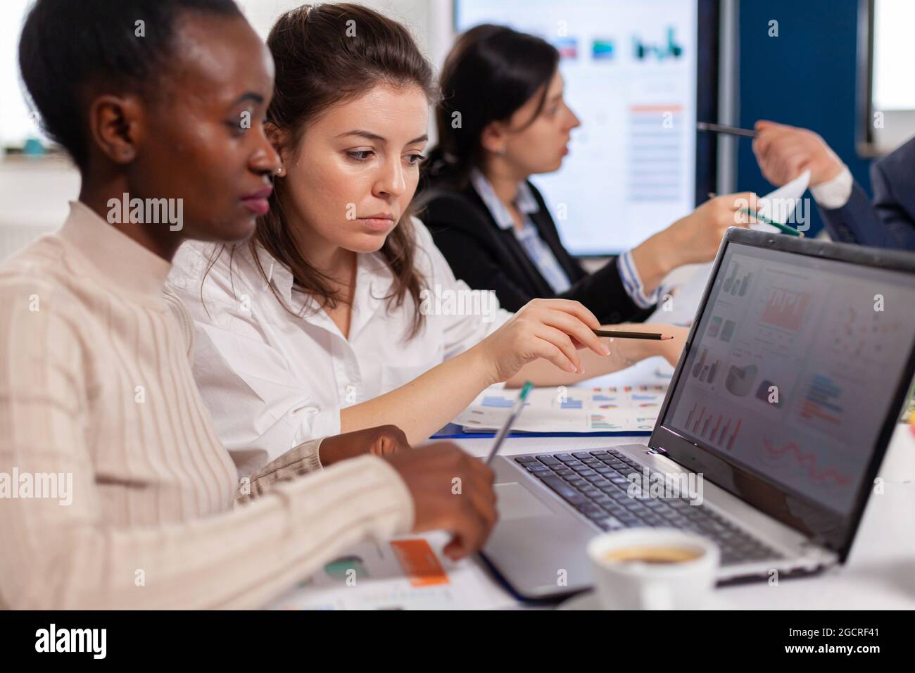 Cheerful african business lady typing hi-res stock photography and ...