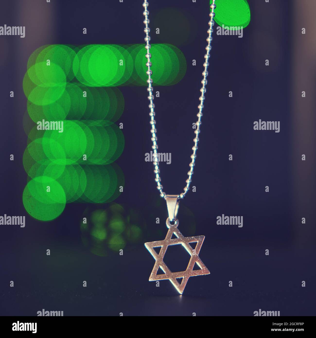 The Jewish symbol of the star of David on the background of computer ...