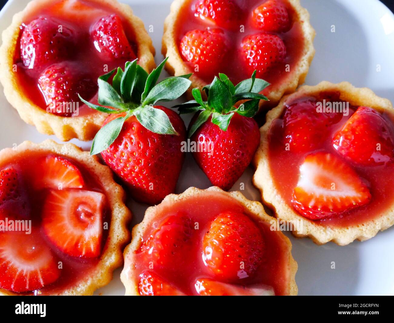 Small delicious strawberry tarts Stock Photo - Alamy