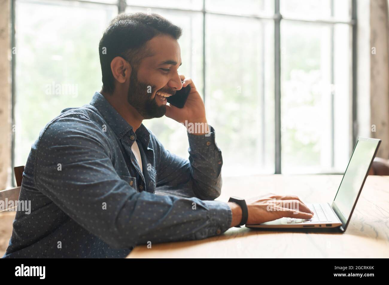 Indian freelancer guy talking hi-res stock photography and images - Alamy