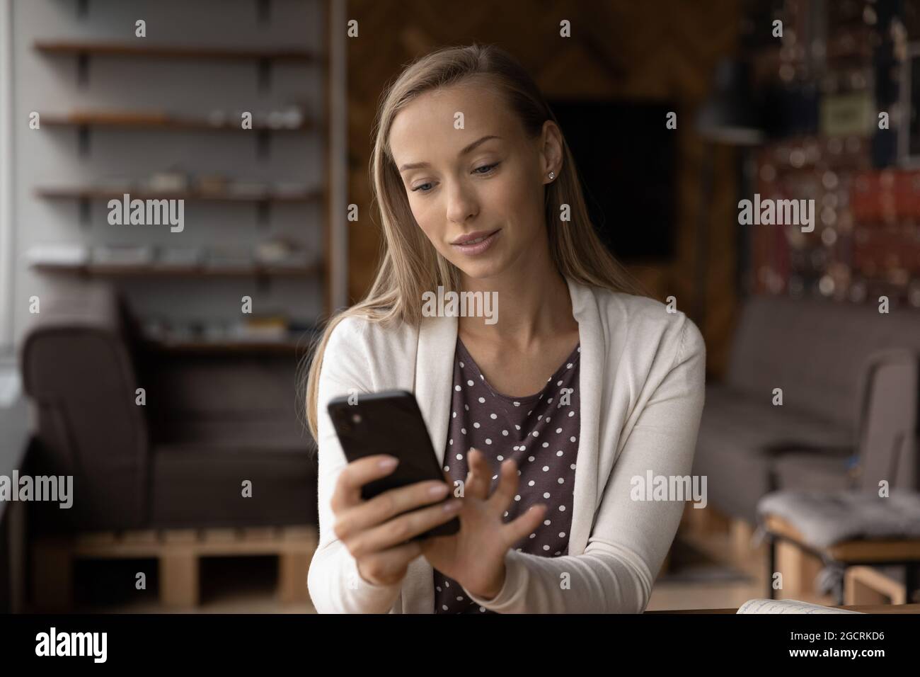 Focused positive young business woman making call on cellphone Stock ...