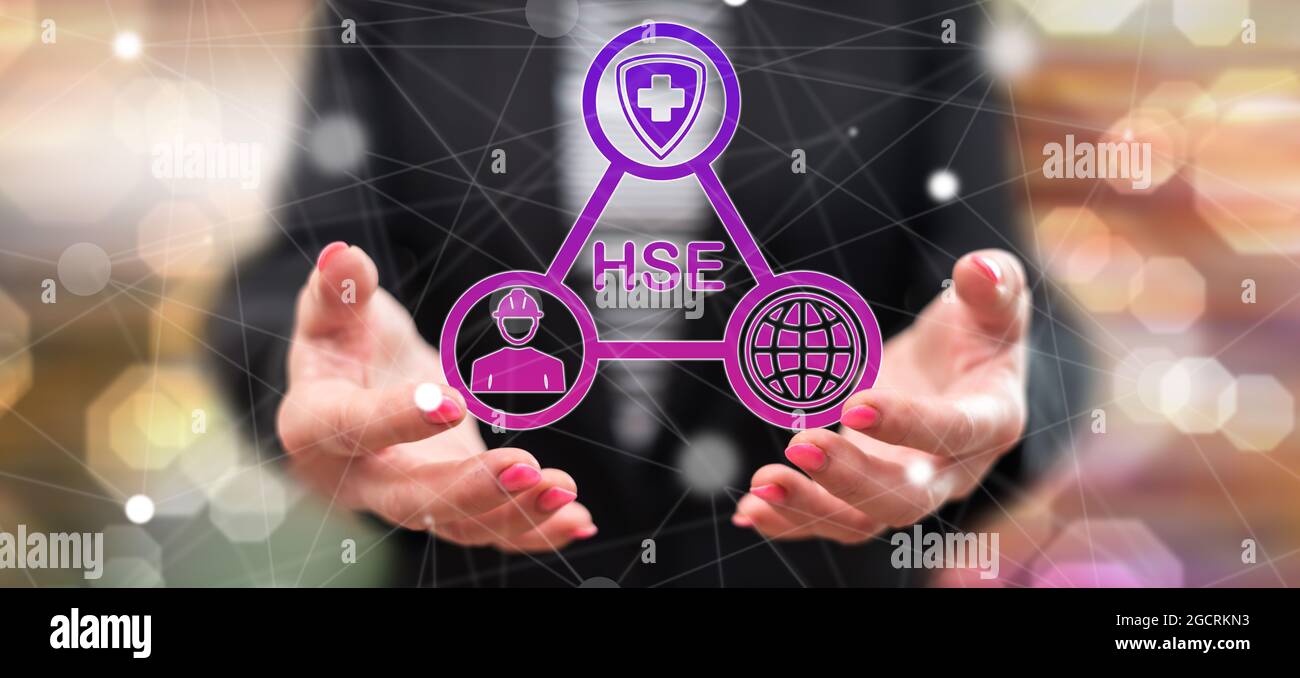 Hse concept above the hands of a woman in background Stock Photo - Alamy